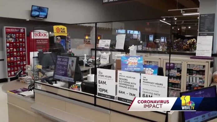 Grocers installing plexiglass barriers between cashiers, customers ...